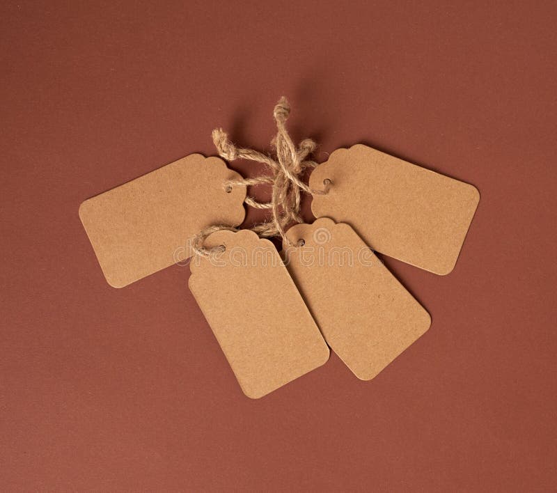 Empty Paper Brown Rectangular Price Tag on a Rope Stock Image - Image ...