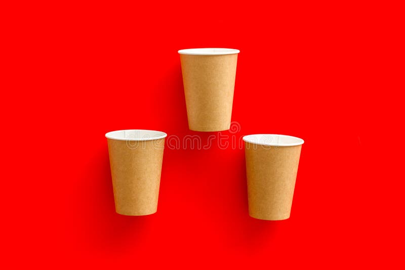 Empty Paper Cups for Coffee To-go from Cafe on Red Background Top View ...