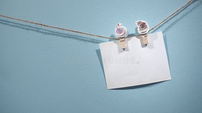 Empty Paper Hanging on Wall by Clothespin. Stock Image - Image of empty ...