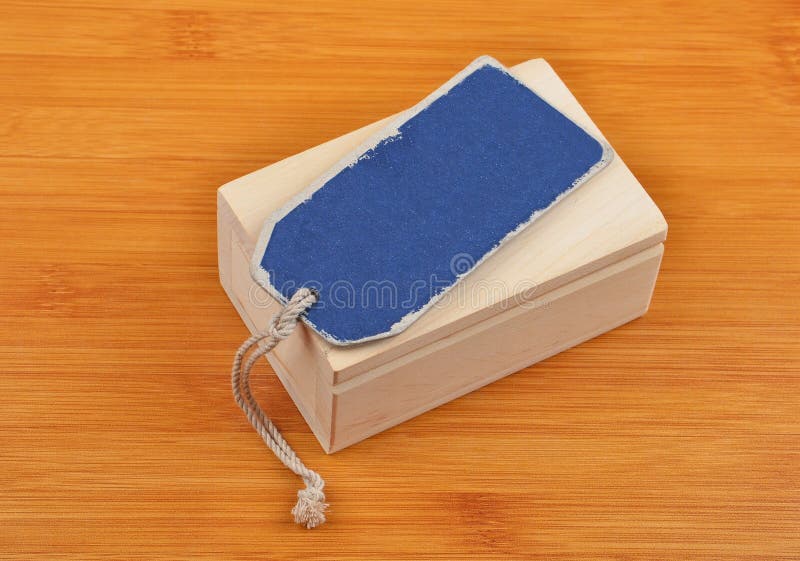 Tag and wooden box stock image. Image of badge, pack - 105872893