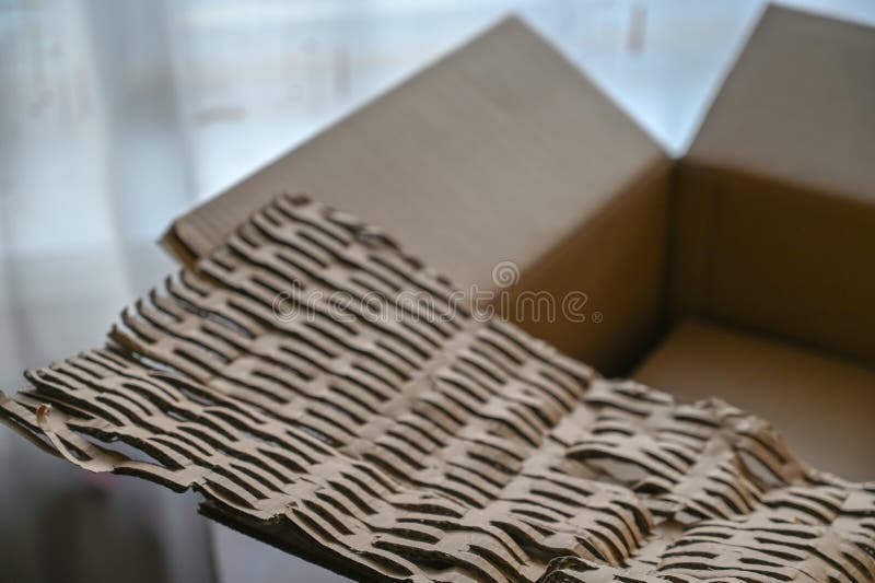 Empty Parcel Box and Protective Filler. Eco-friendly Filler Made of ...