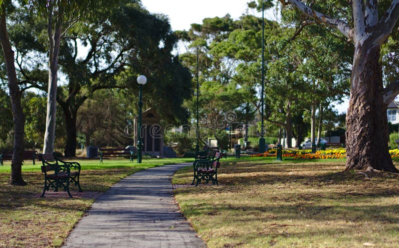 Empty Park Full of Green Grass with Clouds Background Stock Photo ...