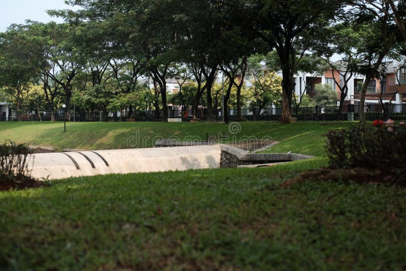 Empty Park during the Day Near a Housing Complex Stock Photo - Image of ...