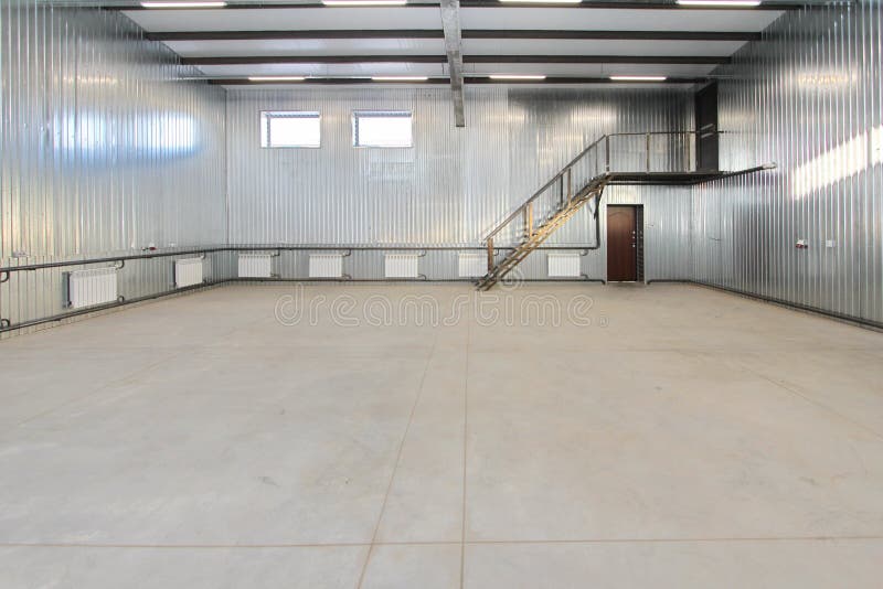 Empty Parking Garage, Warehouse Interior with Large White Gates and ...