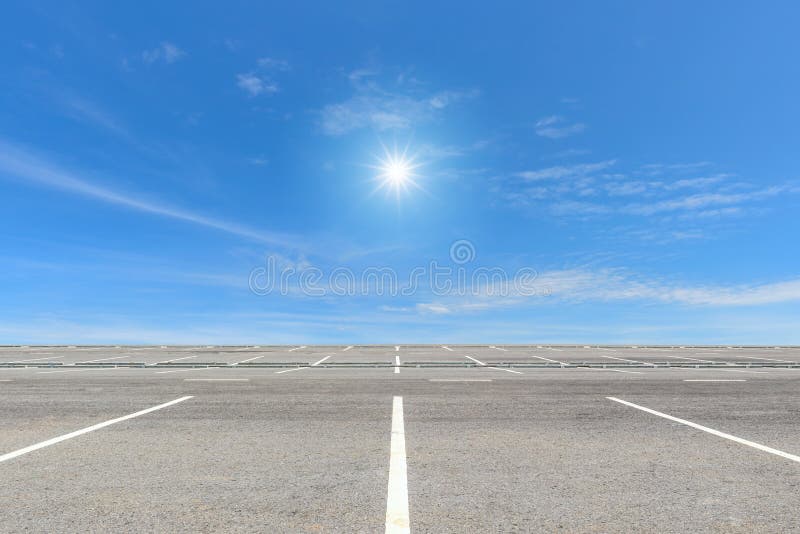 Empty Parking Lot on Blue Sky Stock Photo - Image of divide, gray: 87331990