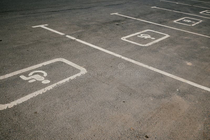 Empty Parking Spaces with Disabled Markings Visible Stock Photo - Image ...