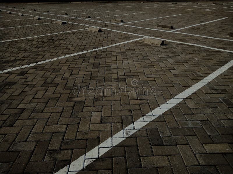 Empty Parking Spaces Outdoor with Brick Tiles Ground Stock Photo ...