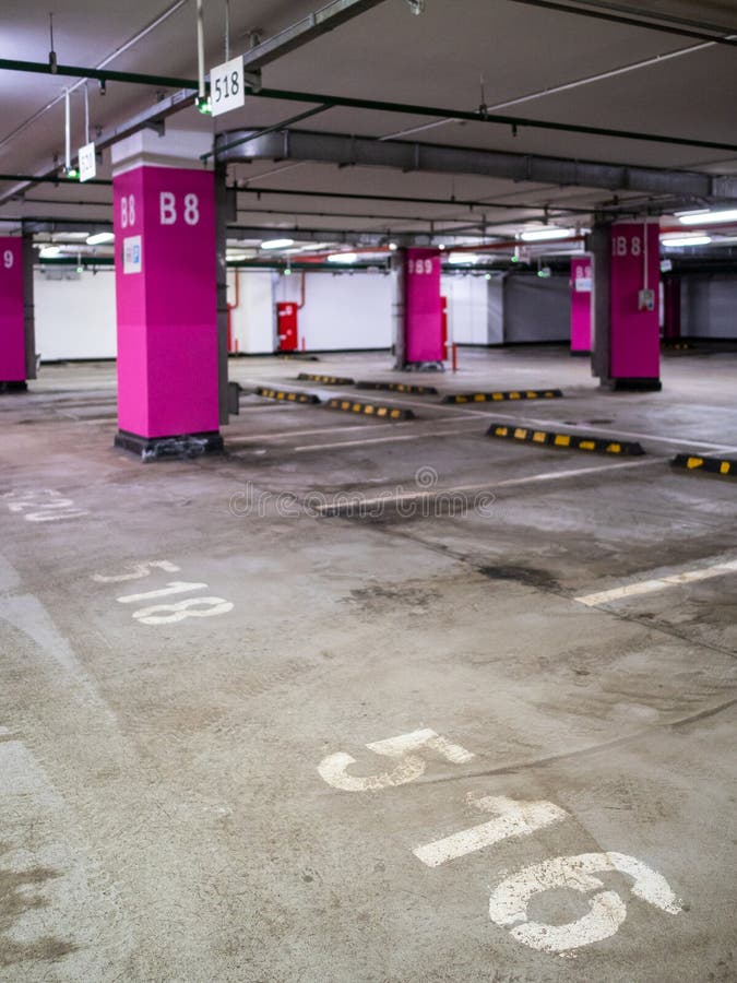 Empty Parking Spaces in Underground Parking Area Stock Image - Image of ...