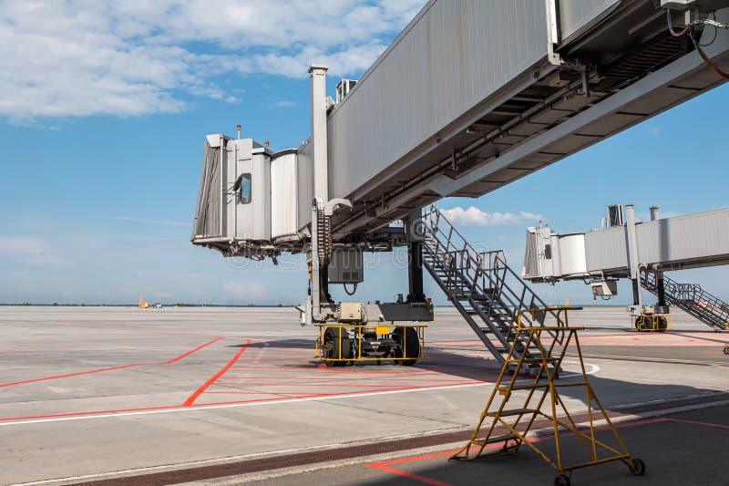 Empty Passenger Air Bridges at Airport Apron Stock Photo - Image of ...