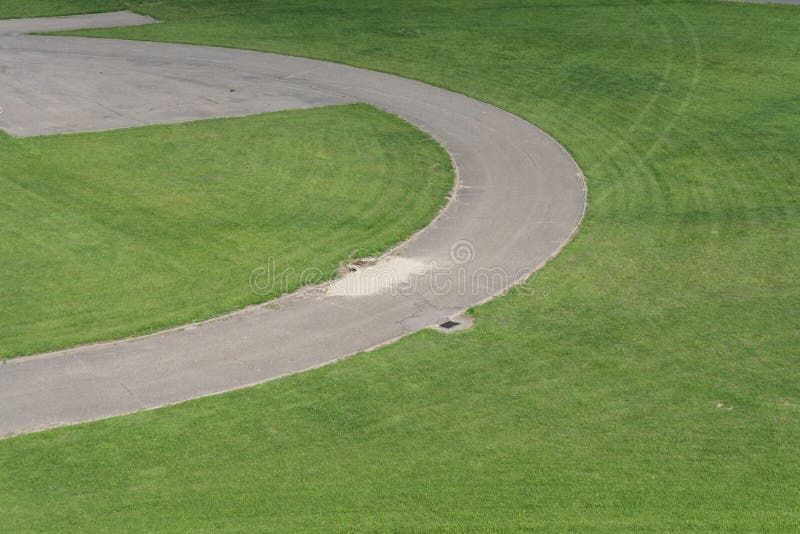 Empty path on green grass stock image. Image of road - 159353641