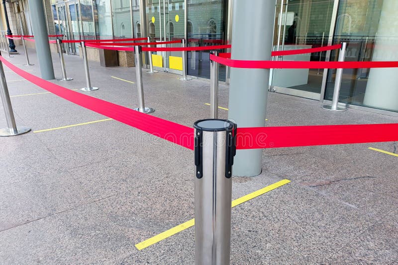 Red Tape in the Airport - Stop No Entry. Barrier Tape in a Large Store ...