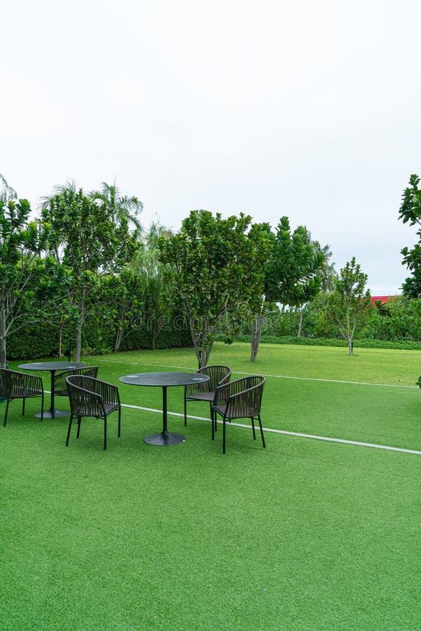 Empty Patio Outdoor Chair and Table Stock Photo - Image of flower ...