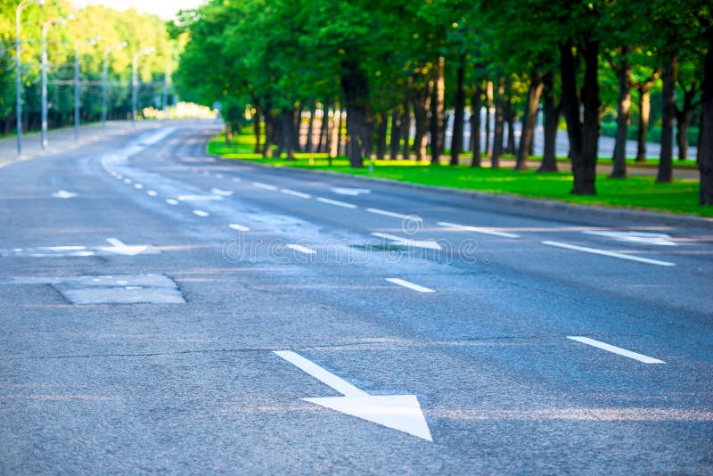 An Empty Paved Road with Markings Early in the Morning Stock Photo ...