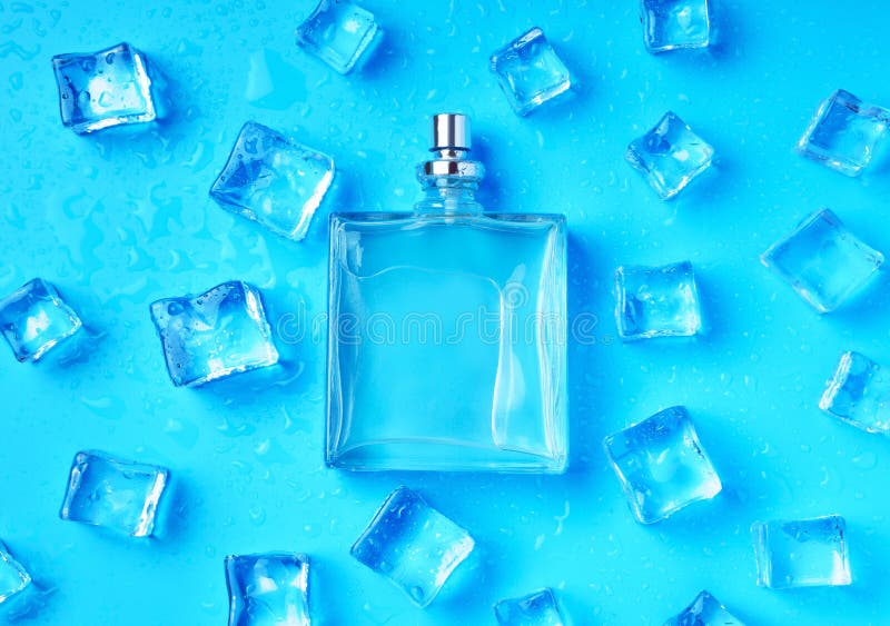Empty Perfume Bottle Lying on a Frosty Backdrop with Ice Cubes. Stock ...