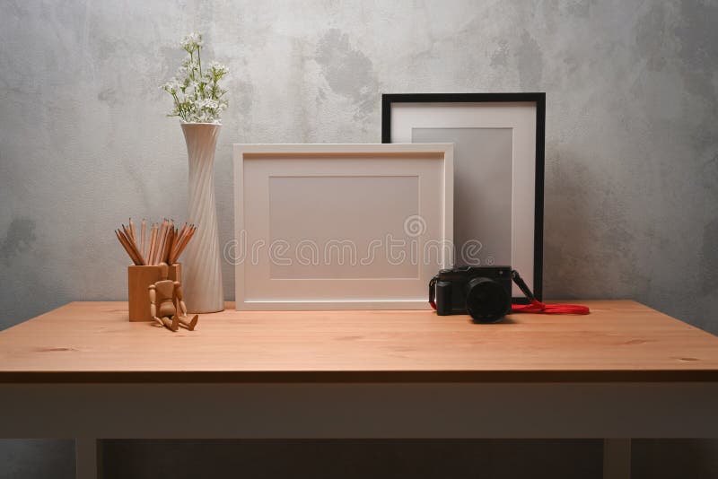 Photo Frame, Pencil Holder and Camera on Wooden Desk. Stock Image ...