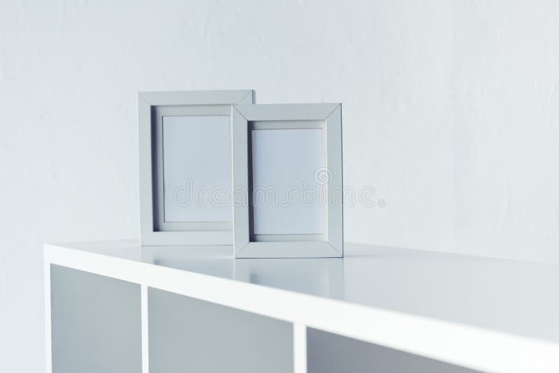 Empty Photo Frames on Bookshelf Stock Image - Image of solid, copy ...