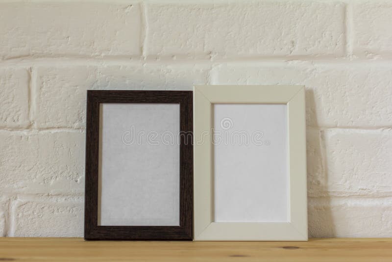 Empty Photo Frames on the Table with Copy Space. Stock Image - Image of ...