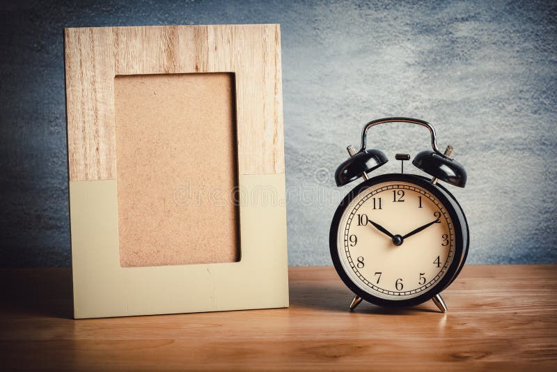Empty Picture Frame with Clock on Table Stock Photo - Image of morning ...