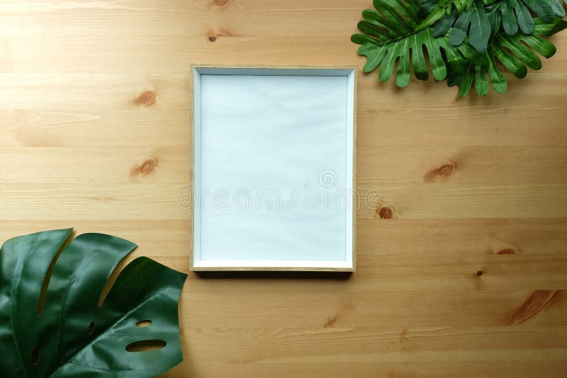 Empty Picture Frame on Wooden Table in Bright Living Room Stock Photo ...