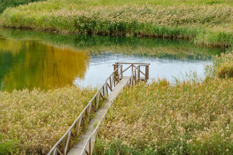 Empty Pier on the Scenic Lake Stock Photo - Image of relaxation, alone ...