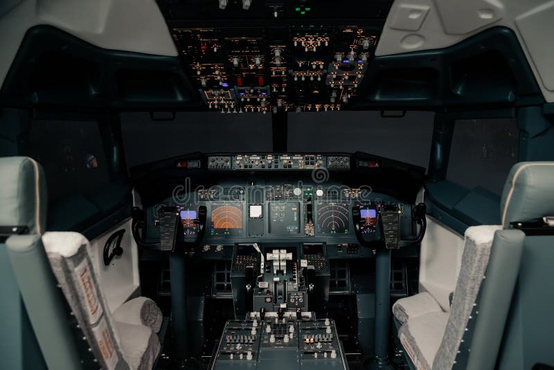 Empty Pilot Cockpit with Switched on Flight Deck Dashboard in Night ...