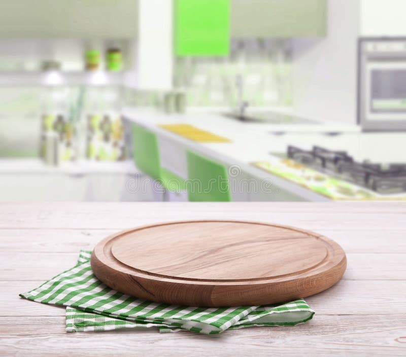 Empty Pizza Board with Tablecloth on the Table and Kitchen Interior ...