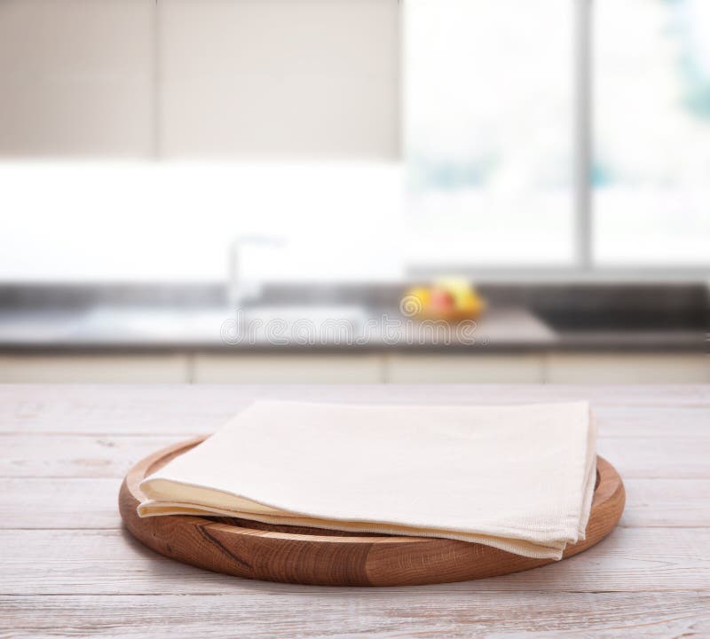 Empty Pizza Board with Tablecloth on the Table and Kitchen Interior ...
