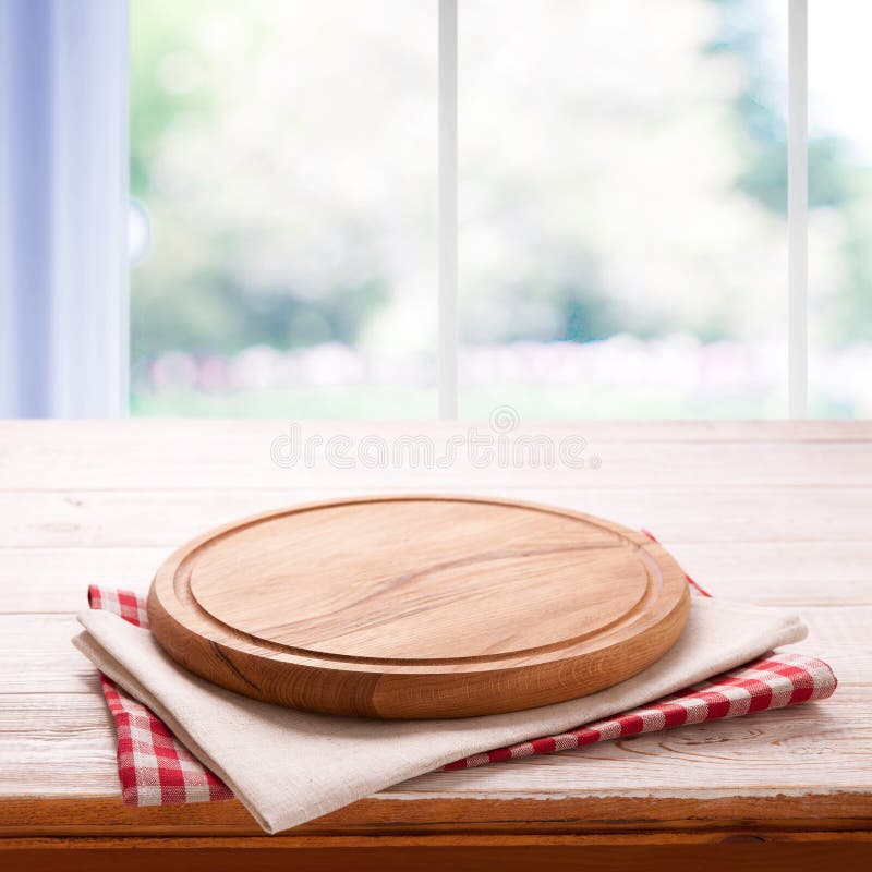 Empty Pizza Board with Tablecloth on the Table and Kitchen Window ...