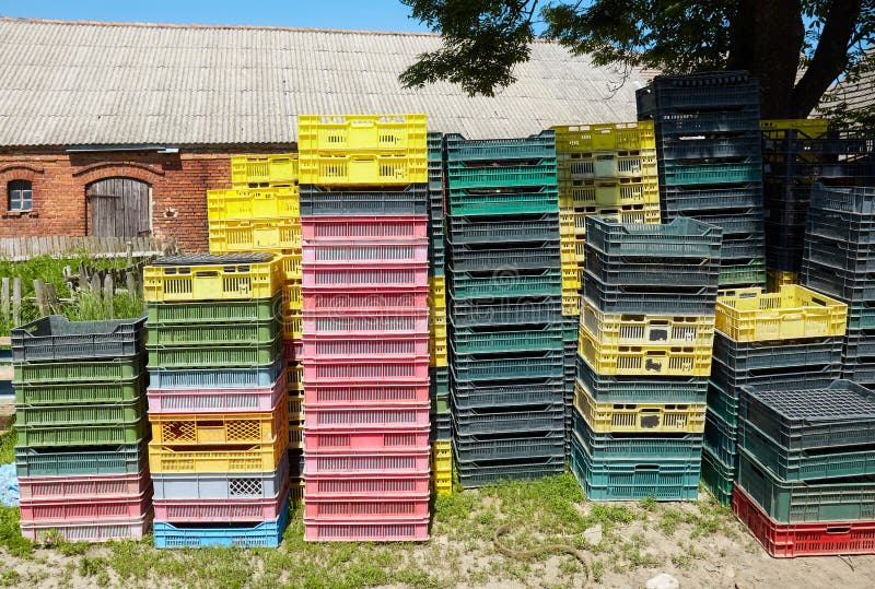 Empty Plastic Containers Used for Vegetables Transportation Piled at a ...