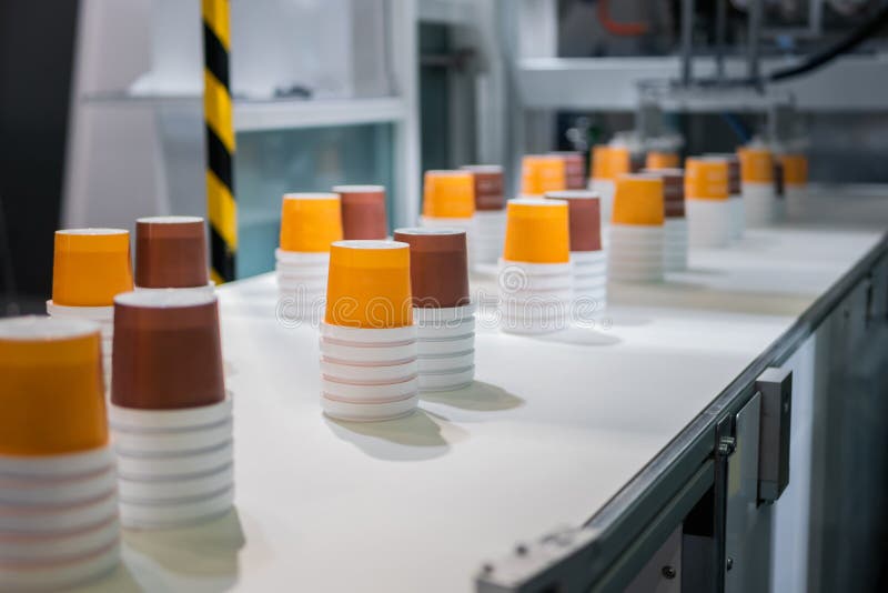 Empty Plastic Cups Moving on Conveyor Belt at Package Exhibition Stock ...
