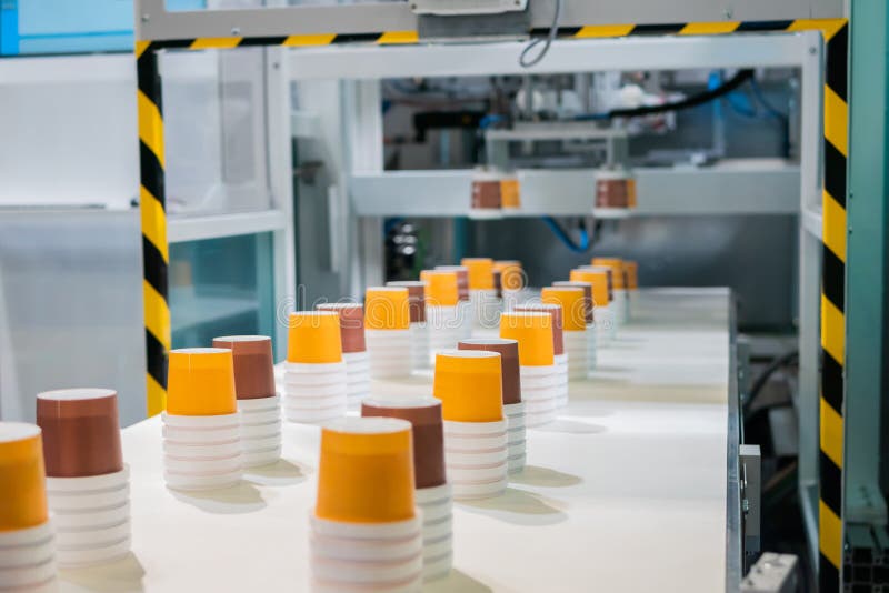 Empty Plastic Cups Moving on Conveyor Belt at Package Exhibition Stock ...