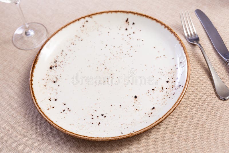 Empty Plate and Cutlery. Dining Table in Restaurant Stock Image - Image ...