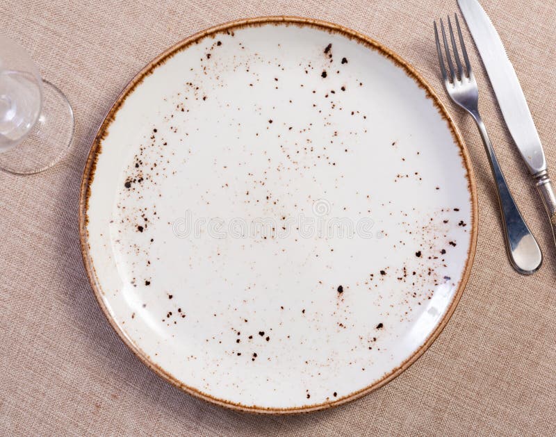 Empty Plate and Cutlery. Dining Table in Restaurant Stock Image - Image ...