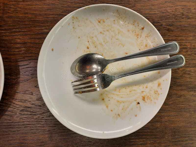 Empty plate after eating stock photo. Image of table - 277640310