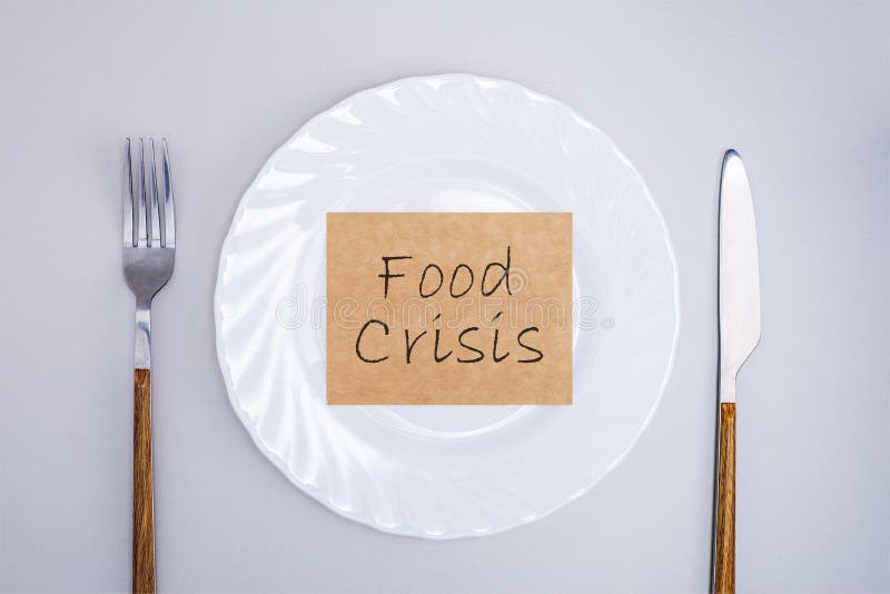 Empty Plate with Poster of Food Crisis. Stock Photo - Image of problem ...