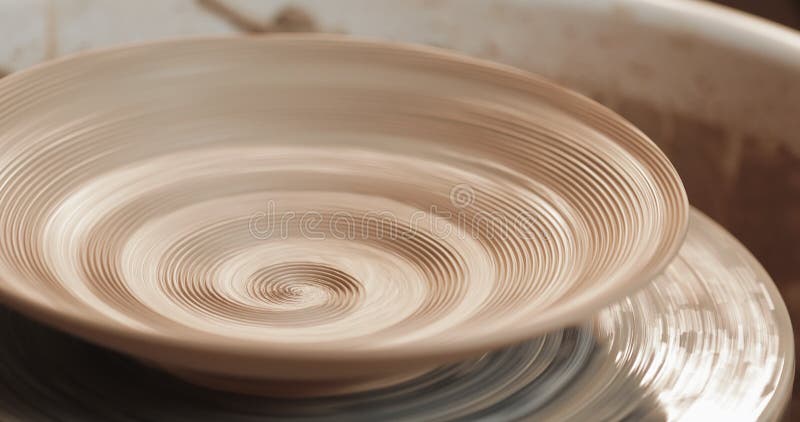 Empty Pottery Wheel Spinning with Clay on Top Stock Footage - Video of ...
