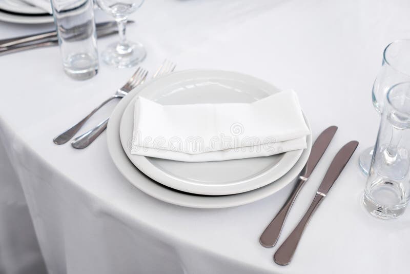 Empty Plate on the Table, Cutlery Set. Table Appointments Stock Photo ...