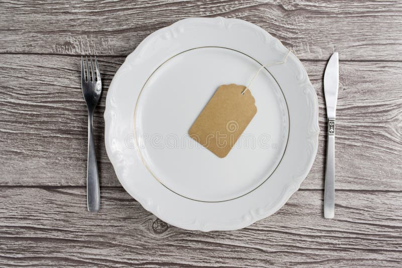 Empty Plate Top View with Label for Prize or Concept. Stock Photo ...