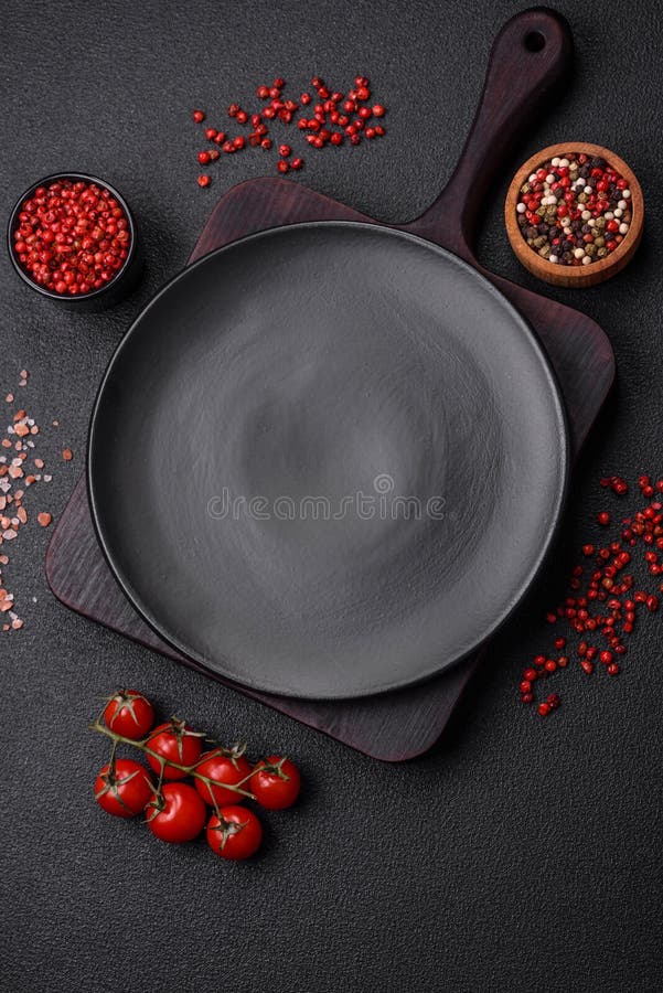 Empty Plate, Wooden Cutting Board with Salt and Spices Stock Photo ...