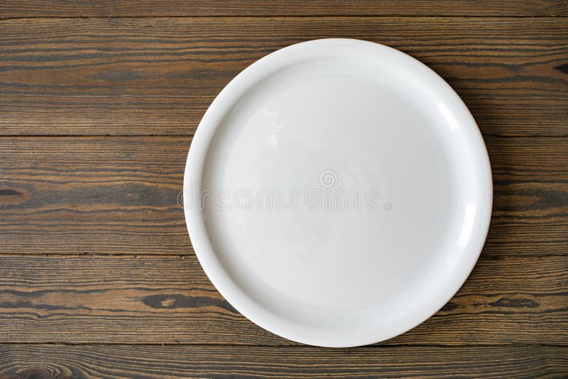 Empty Plate on Wooden Table - Overhead View Stock Image - Image of ...