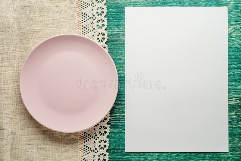 Empty Plate on Wooden Tabletop with Tablecloth and Blank Paper. Flat ...