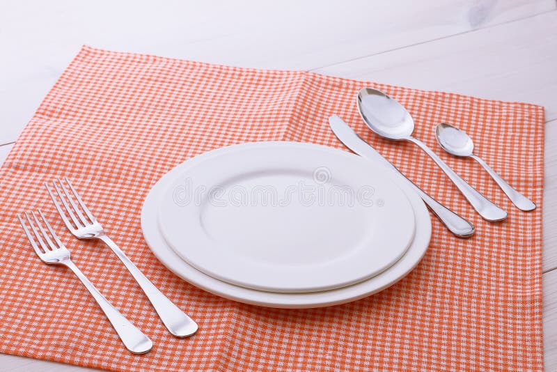 Empty Plates, Cutlery, Tablecloth on White Table Stock Photo - Image of ...