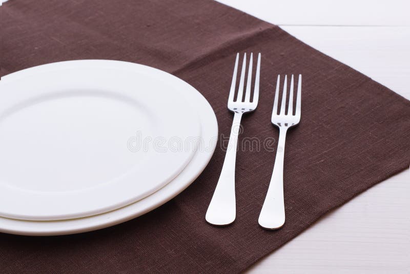 Empty Plates and Cutlery Tablecloth on Wooden Stock Photo - Image of ...