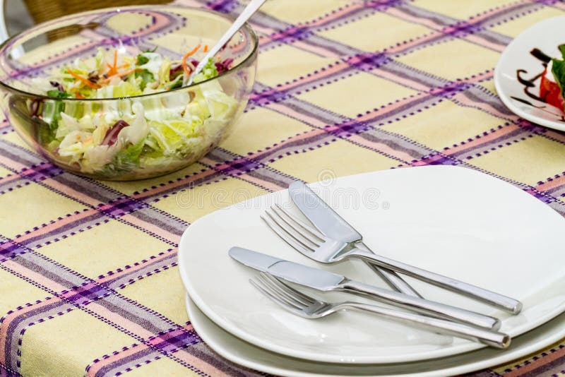Empty Plates and Utensils on a Buffet Table Stock Image - Image of fork ...