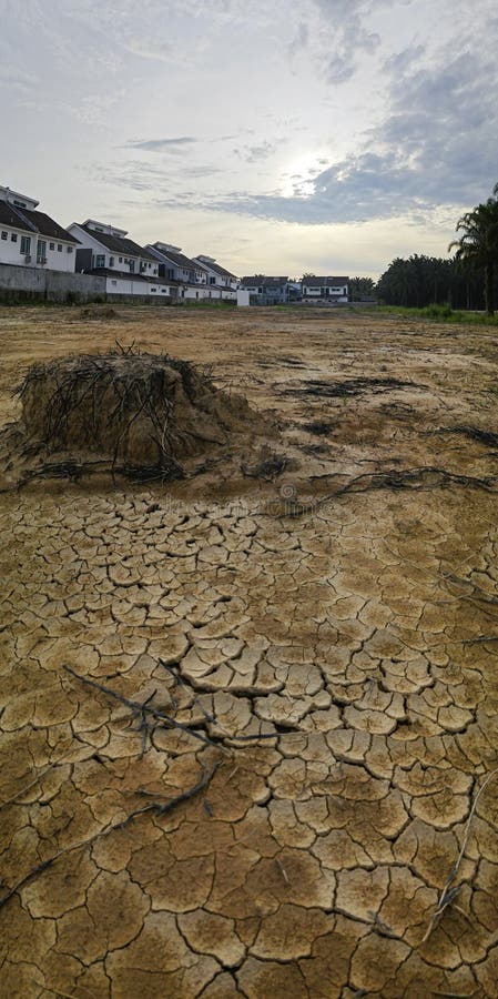 An Empty Plot of Land Scene Besides a Residential Row of Houses. Stock ...