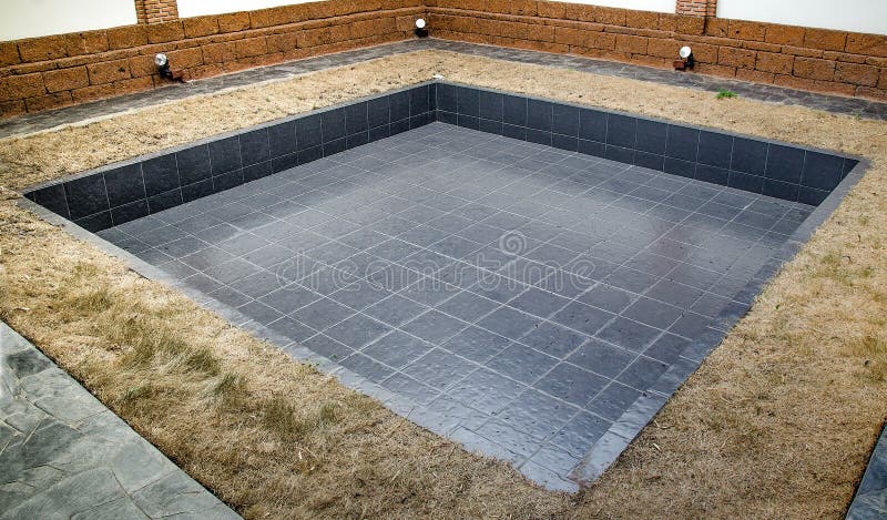 Empty Pool Bed Around Swimming Pool with Umbrella Stock Photo - Image ...