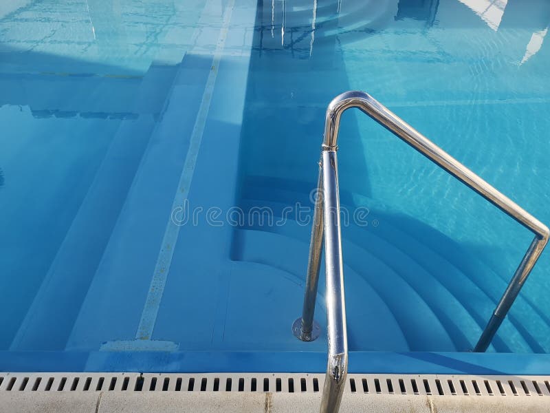 Empty pool inside a hotel stock image. Image of city - 161682717