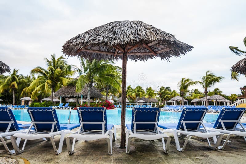 Empty Pool Bed Around Swimming Pool with Umbrella Stock Photo - Image ...