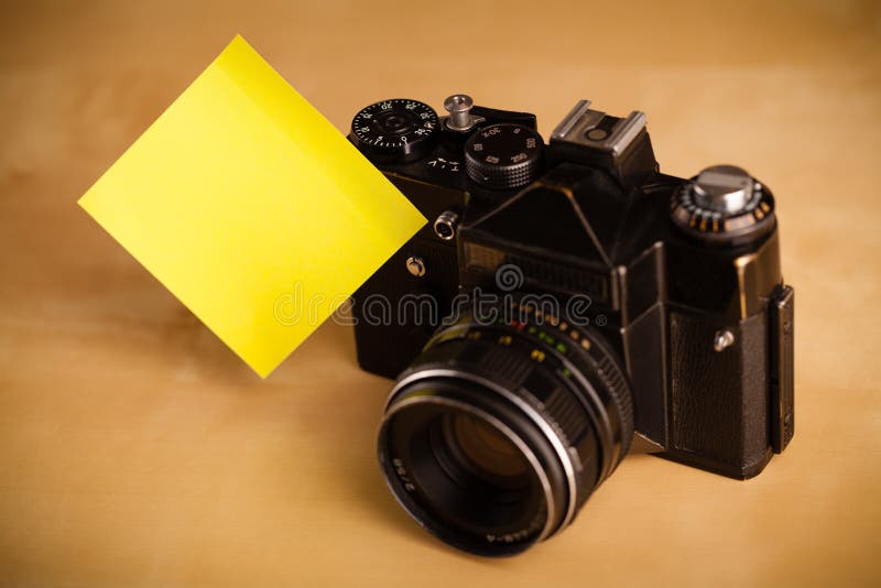 Empty Post-it Note Sticked on Photo Camera Stock Photo - Image of ...