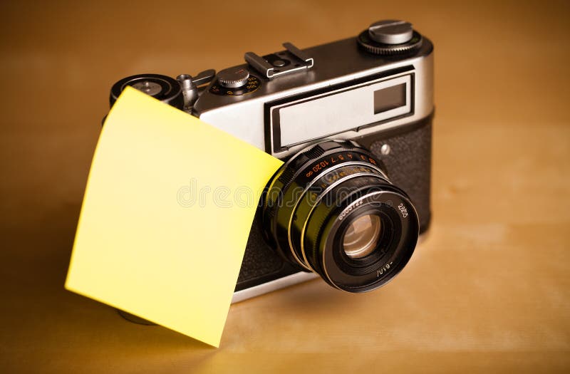 Empty Post-it Note Sticked on Photo Camera Stock Image - Image of ...